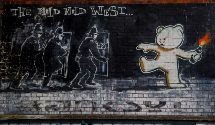 Banksy’s Best Street Art: 10 Powerful Murals By The Elusive Artist