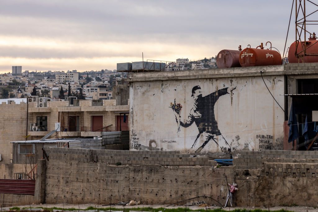 Banksy’s Best Street Art: 10 Powerful Murals By The Elusive Artist